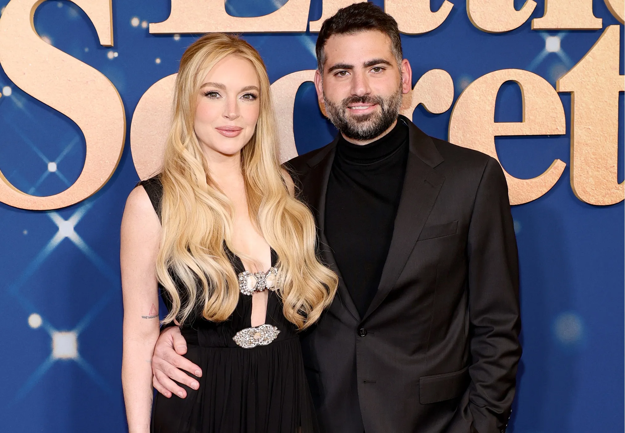 Lindsay Lohan in a semi-transparent dress and with her husband appeared ...